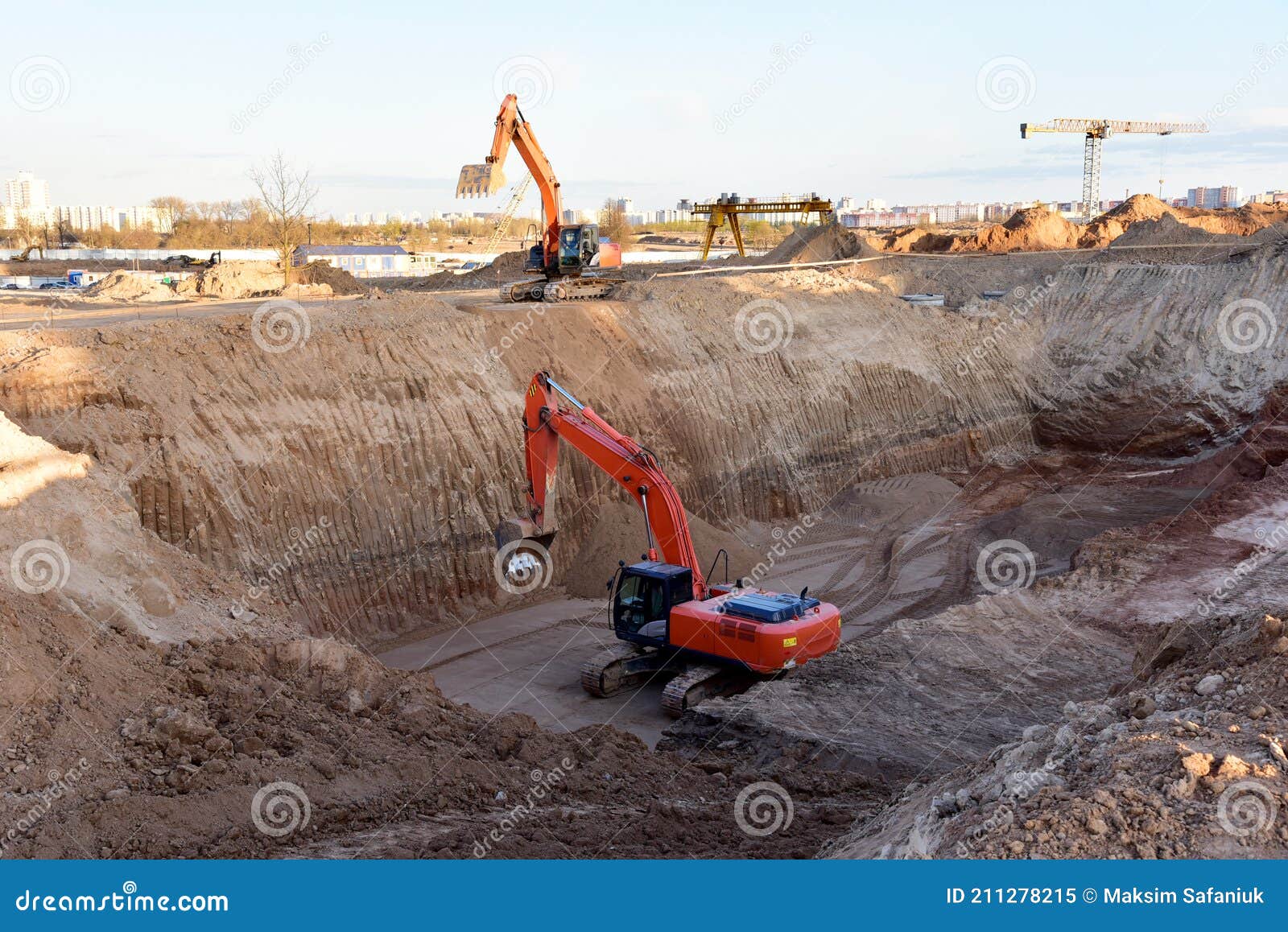 Digging the Pit Foundation a Hole with Excavator. Earthwork in ...