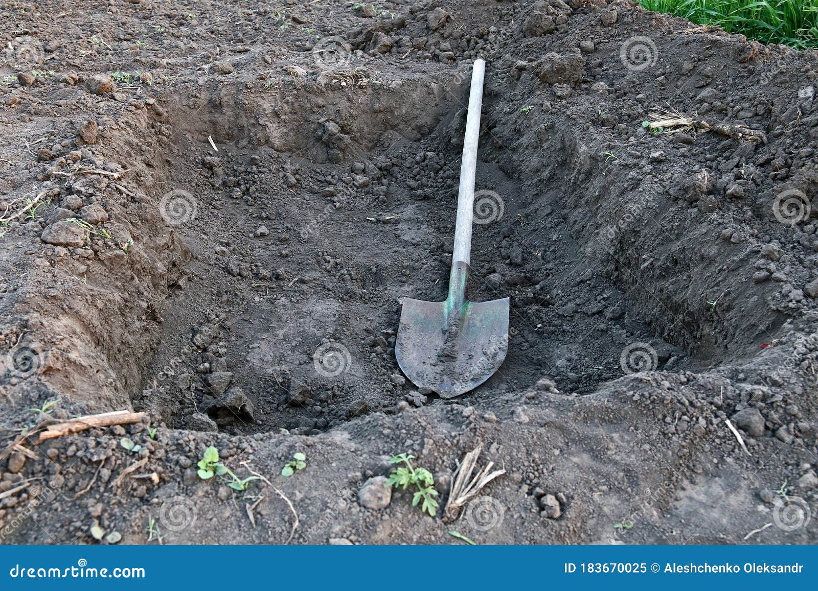 Digging a Pit. the Shovel Lies in the Pit. Stock Image - Image of sand ...