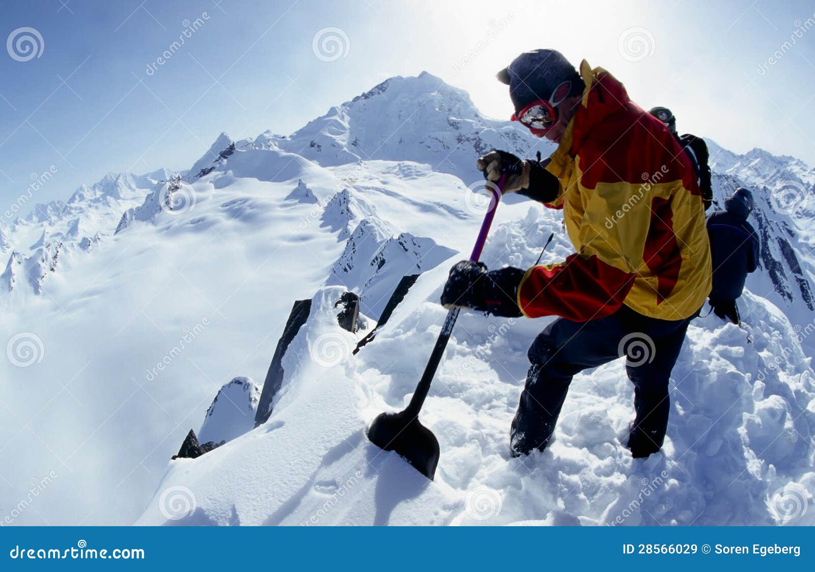 Digging in Snow on a Mountain Top in Alaska Editorial Stock Image ...