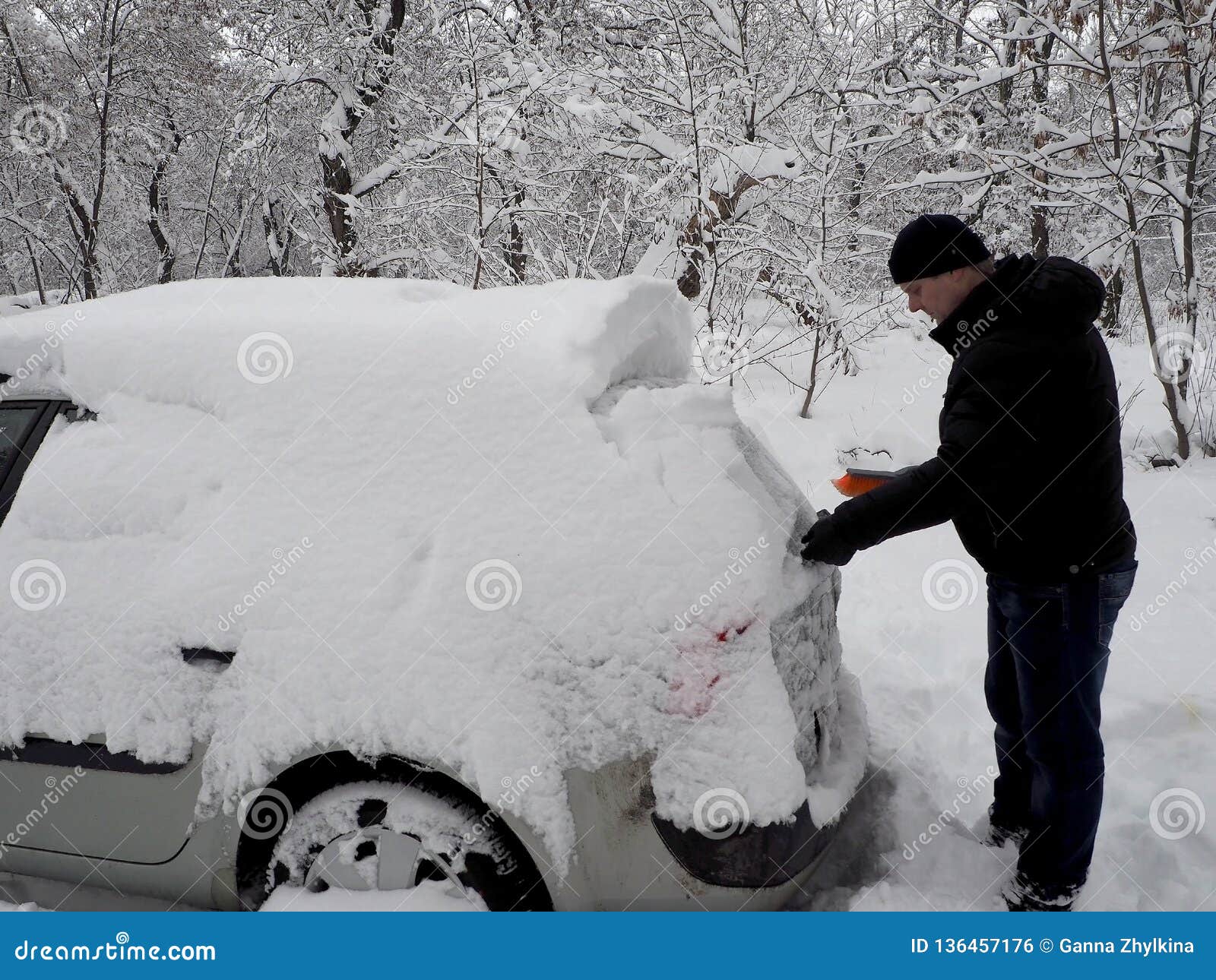 Digging up a snow machine stock photo. Image of snowblower - 136457176