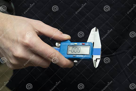 Digital Caliper in the Hands of the Master Stock Photo - Image of ...