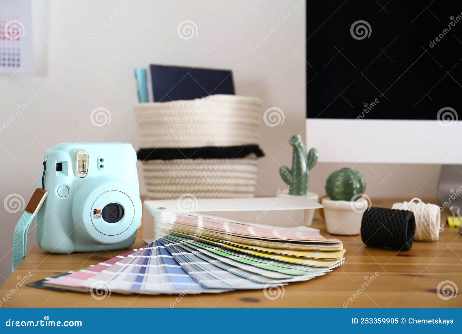 Camera and Color Palette on Table in Studio. Modern Designer`s ...