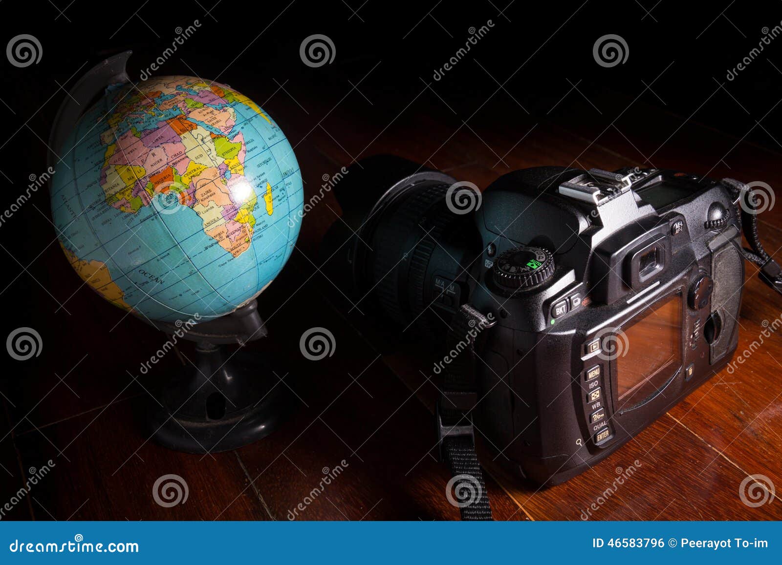 Digital camera with globe. stock photo. Image of objective - 46583796
