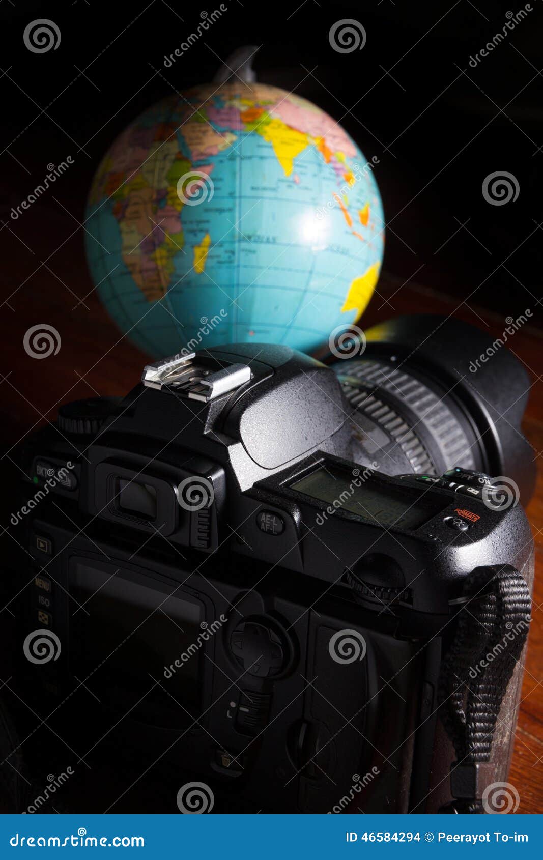 Digital camera with globe. stock photo. Image of instrument - 46584294