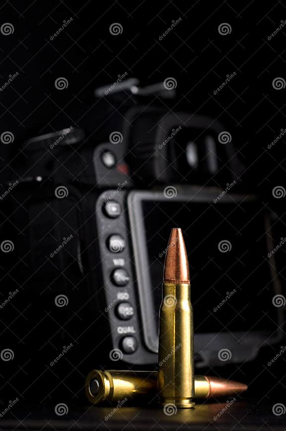 Digital Camera with Large Caliber Bullets Stock Photo - Image of ...