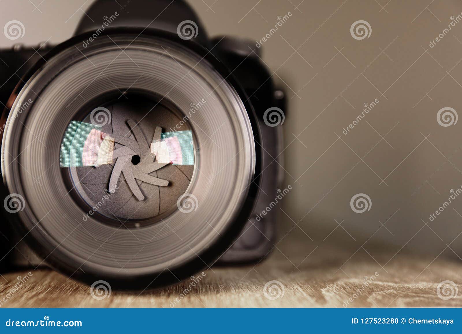 Digital Camera of Professional Photographer on Table Stock Photo ...