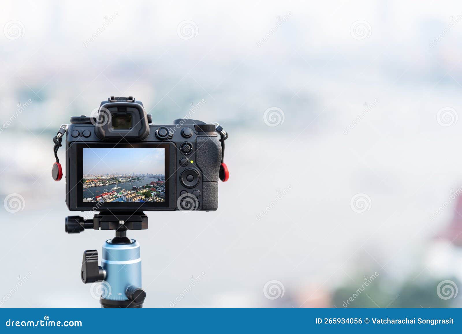 Digital Camera Put on the Tripod for Shoot Something with Landscape of ...