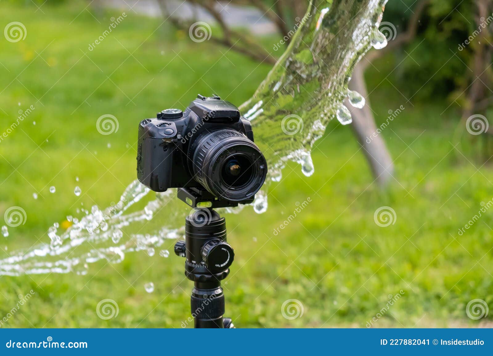 A Digital Camera on a Tripod in the Rain Stock Image - Image of ...
