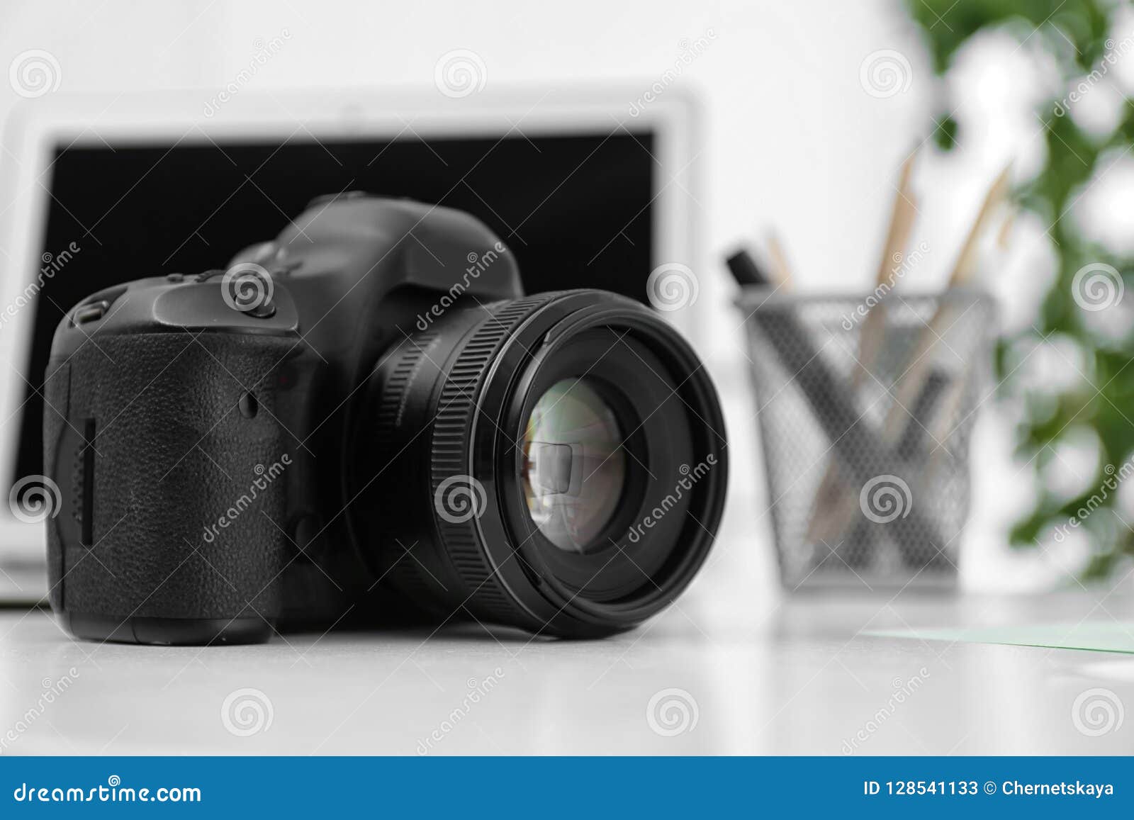 Digital Camera on White Table Stock Image - Image of background ...