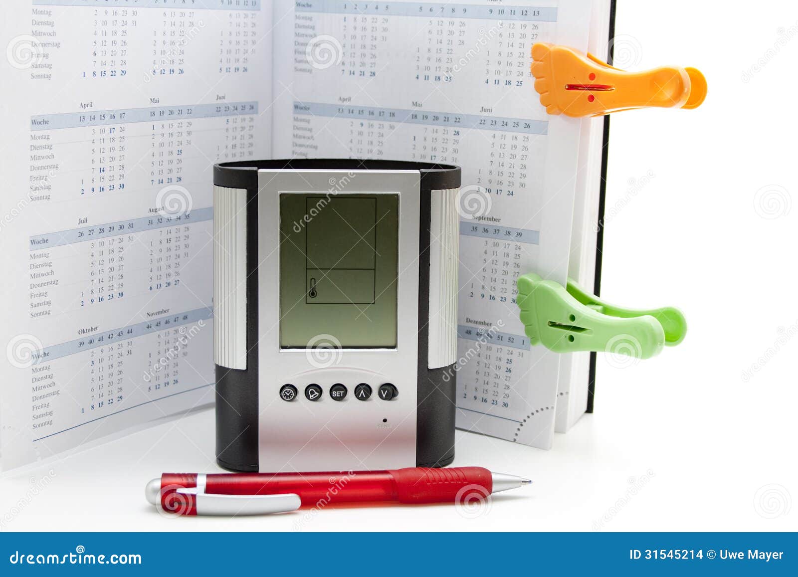 Digital Clock with Ballpoint Pen Stock Photo - Image of writing ...