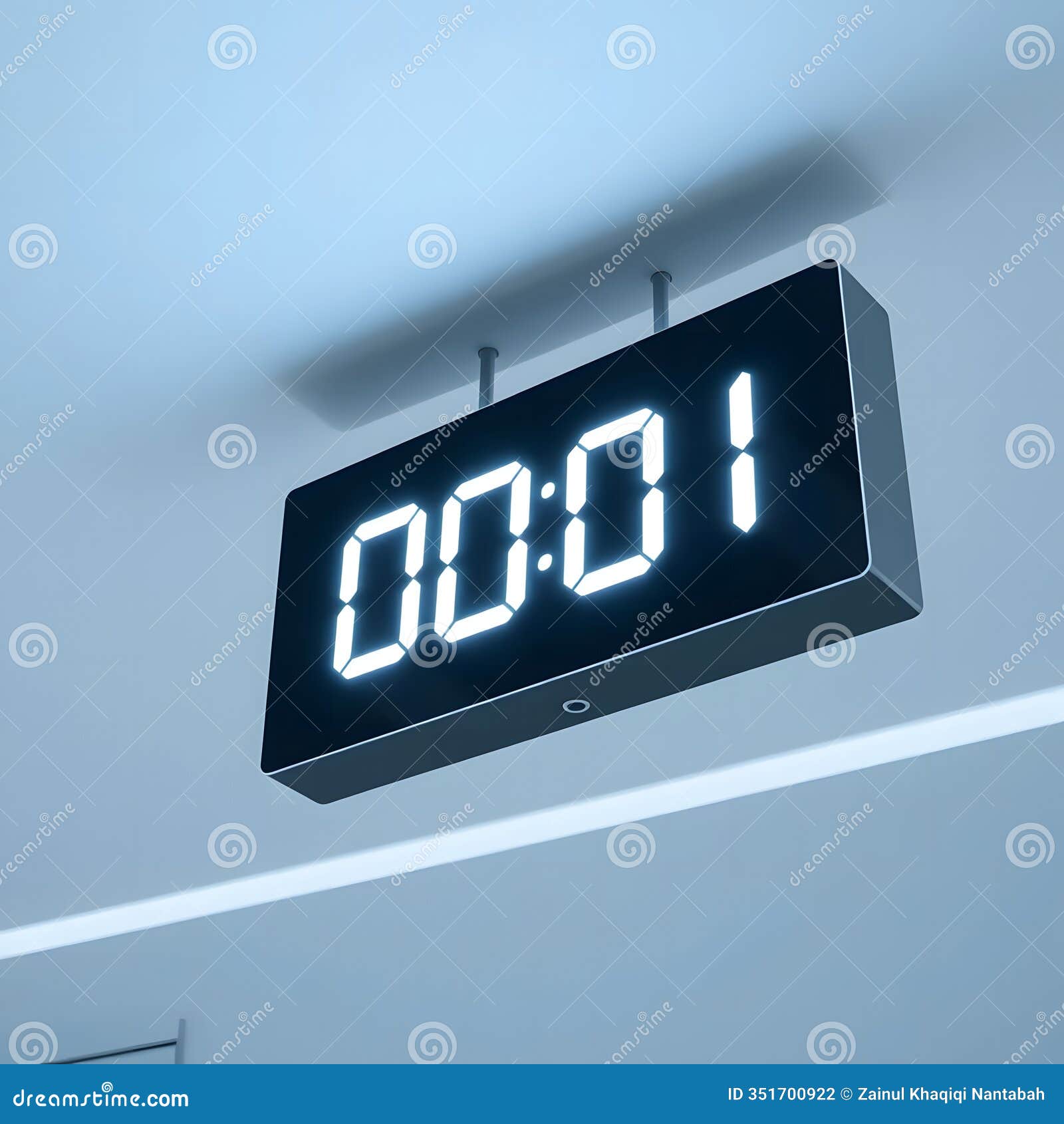 Contemporary Room with Digital Ceiling Clock Showing 00:01 and Recessed ...