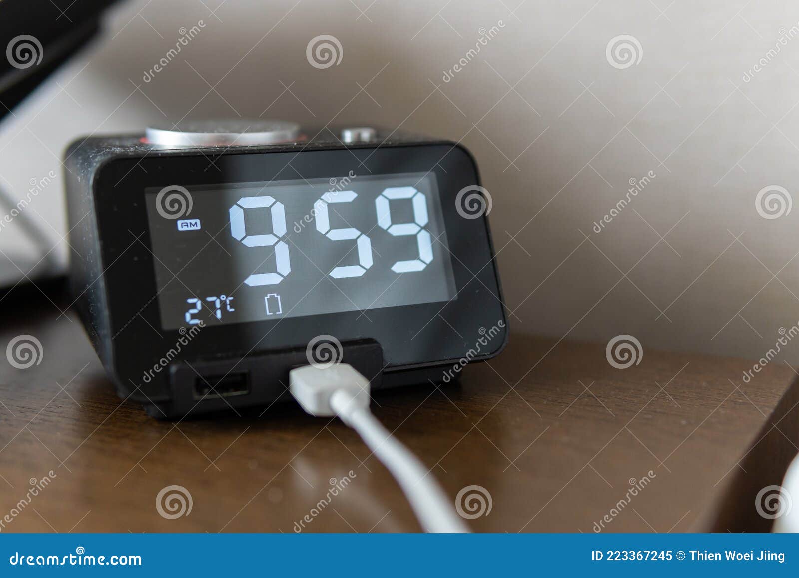 A Digital Clock on Table Showing 9.59 am Morning Stock Image - Image of ...