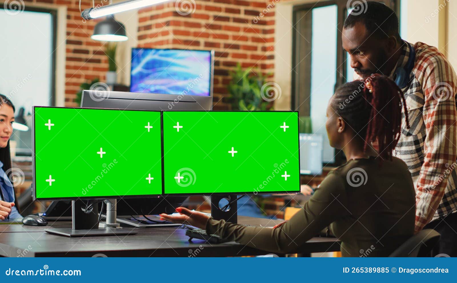Digital Company Employees Using Greenscreen Display on Computers Stock ...