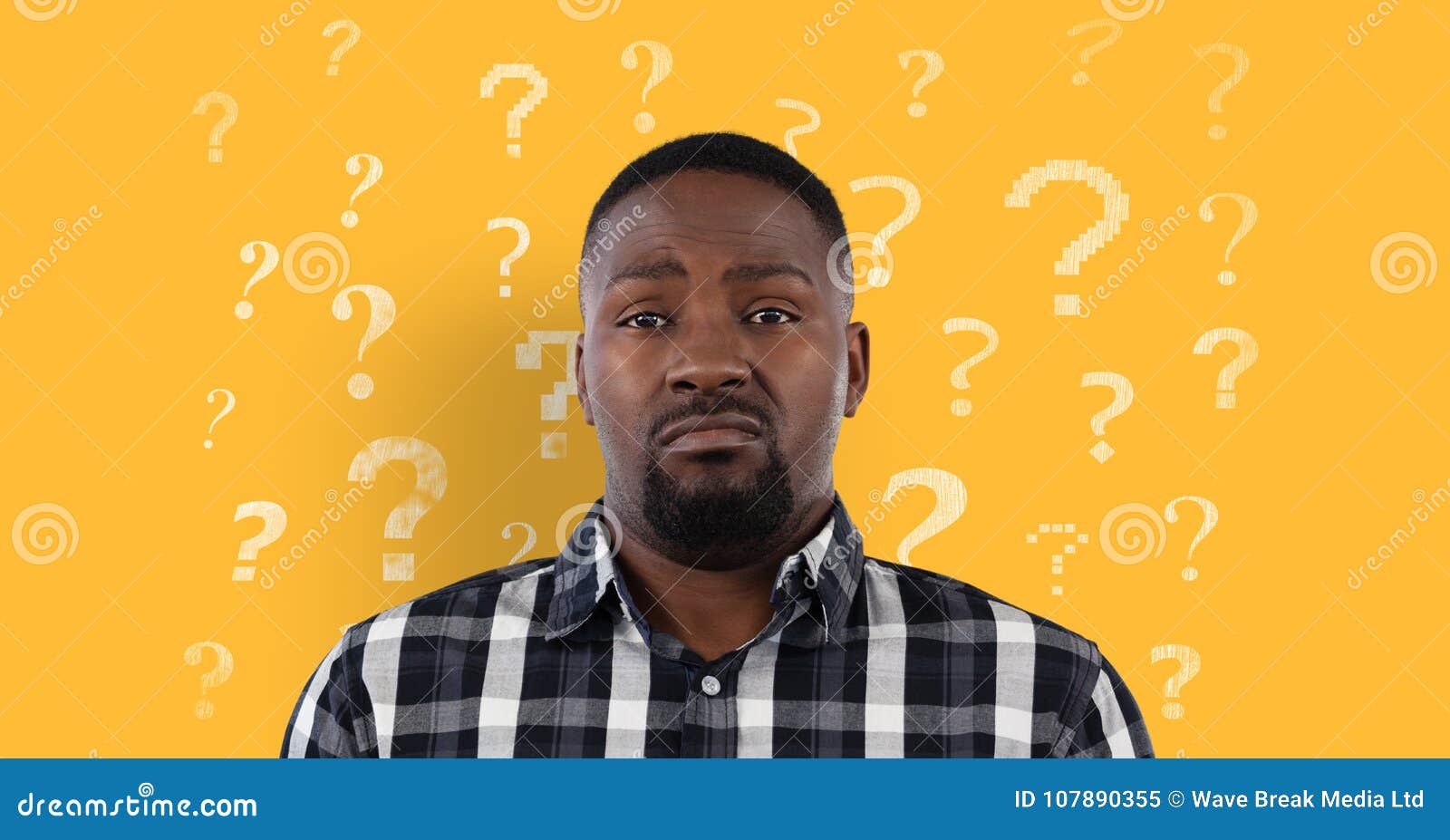 Confused or Disgusted Man in Front of a Yellow Background with Question ...
