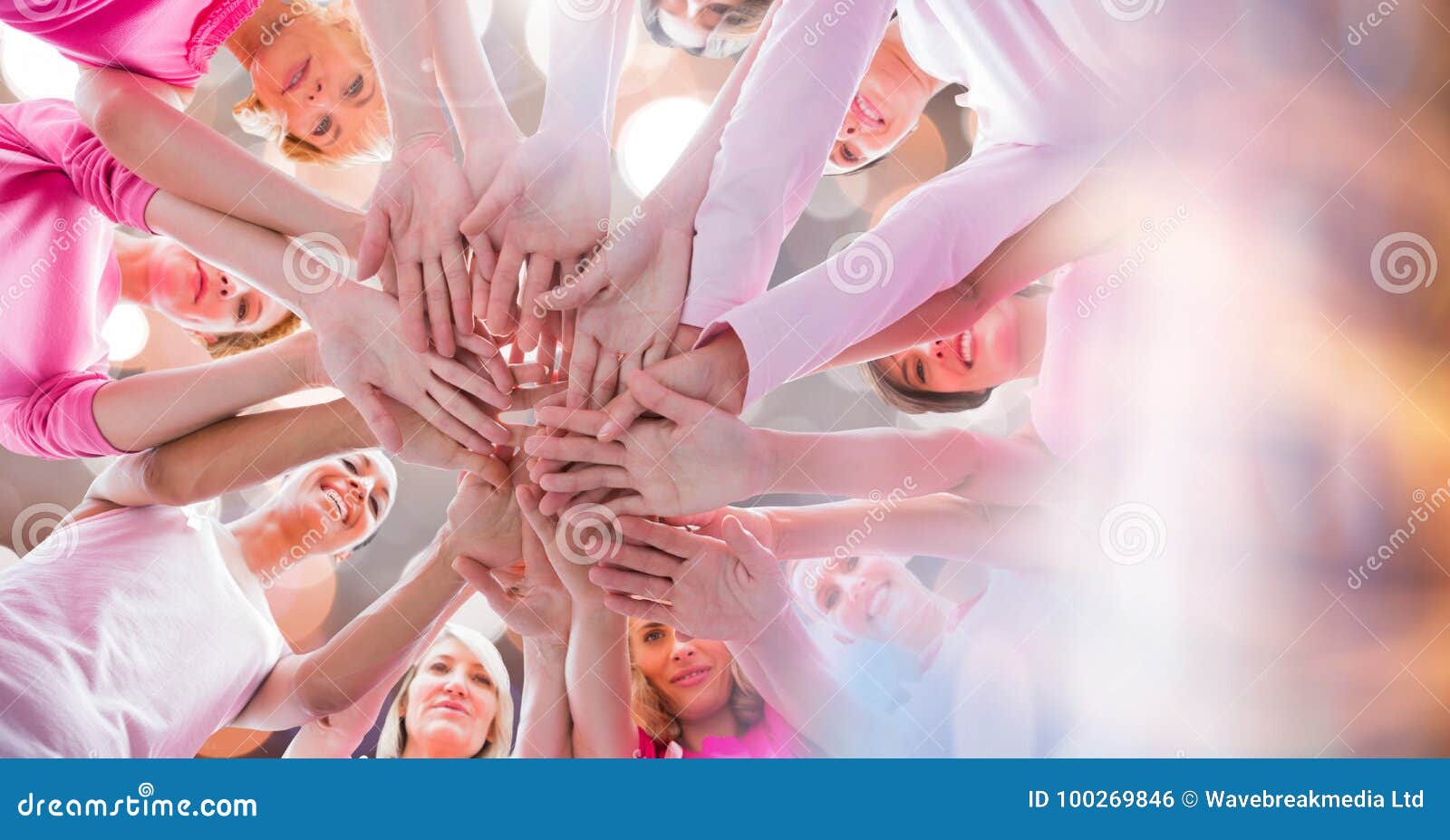 Hands Together in Circle with Bright Lights Stock Photo - Image of ...