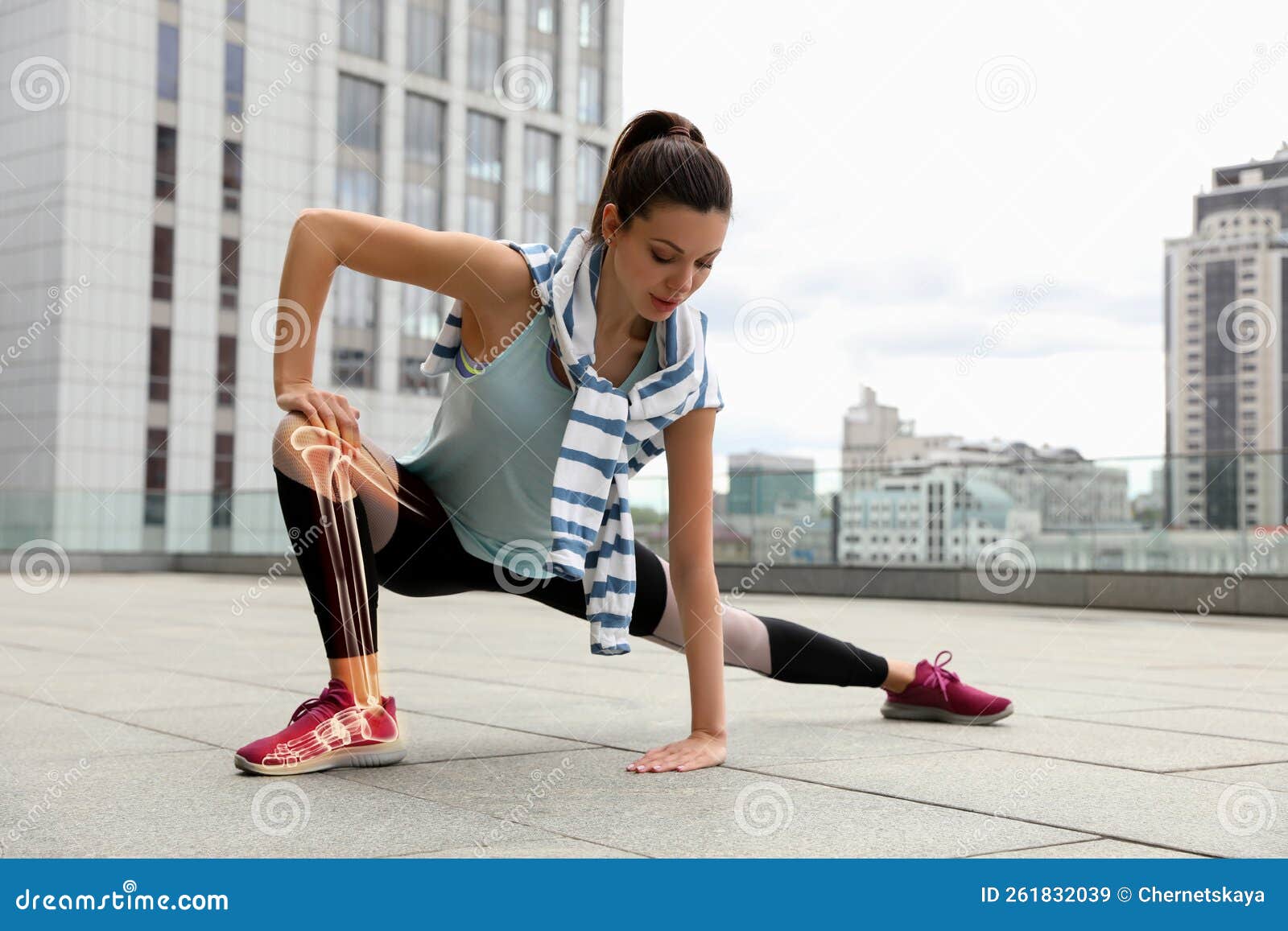 Digital Composite of Highlighted Bones and Woman Doing Fitness Exercise ...