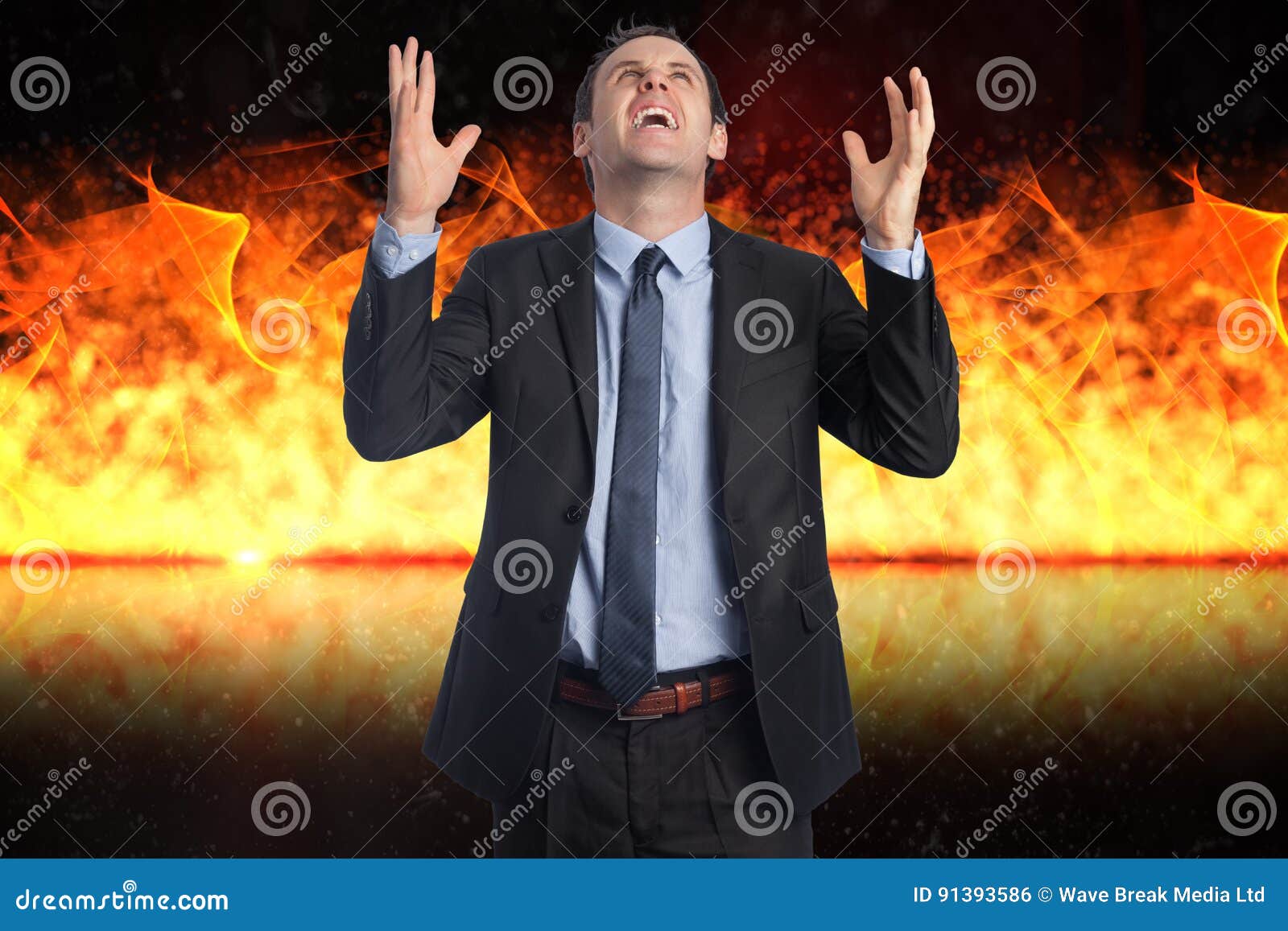 Digital Composite Image of Angry Businessman with Fire in Background ...