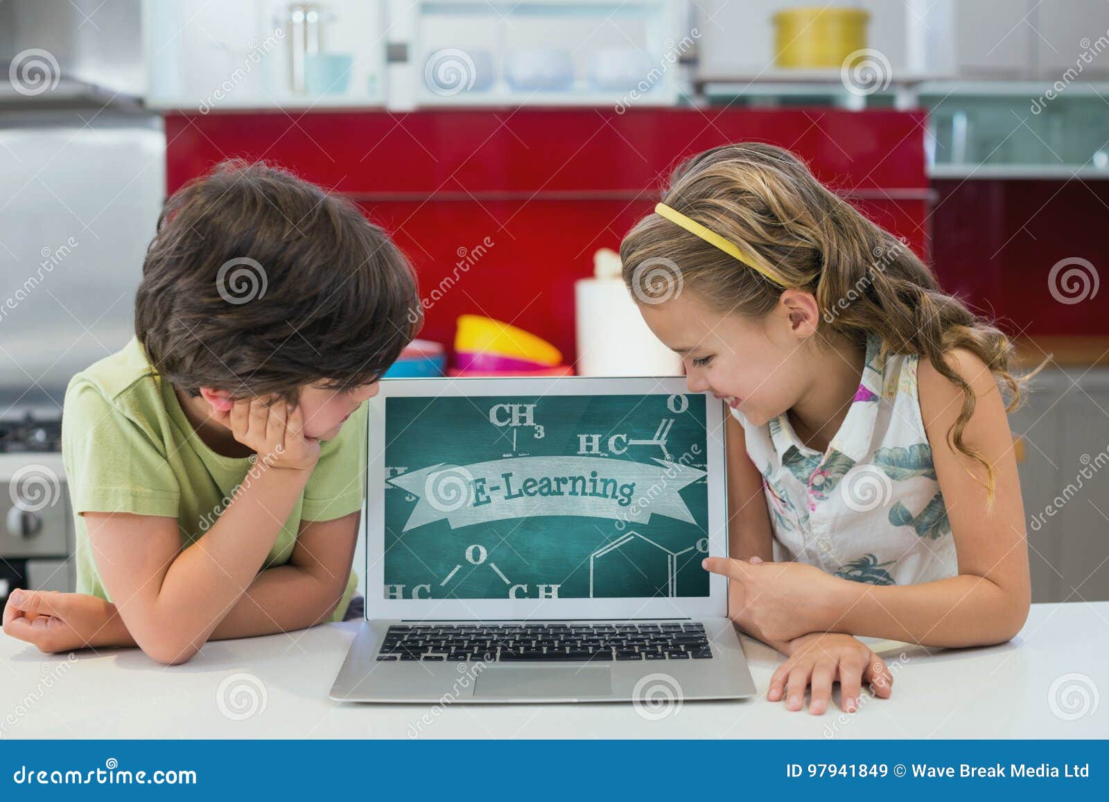 Kids Looking at a Computer with School Icons on Screen Stock Image ...