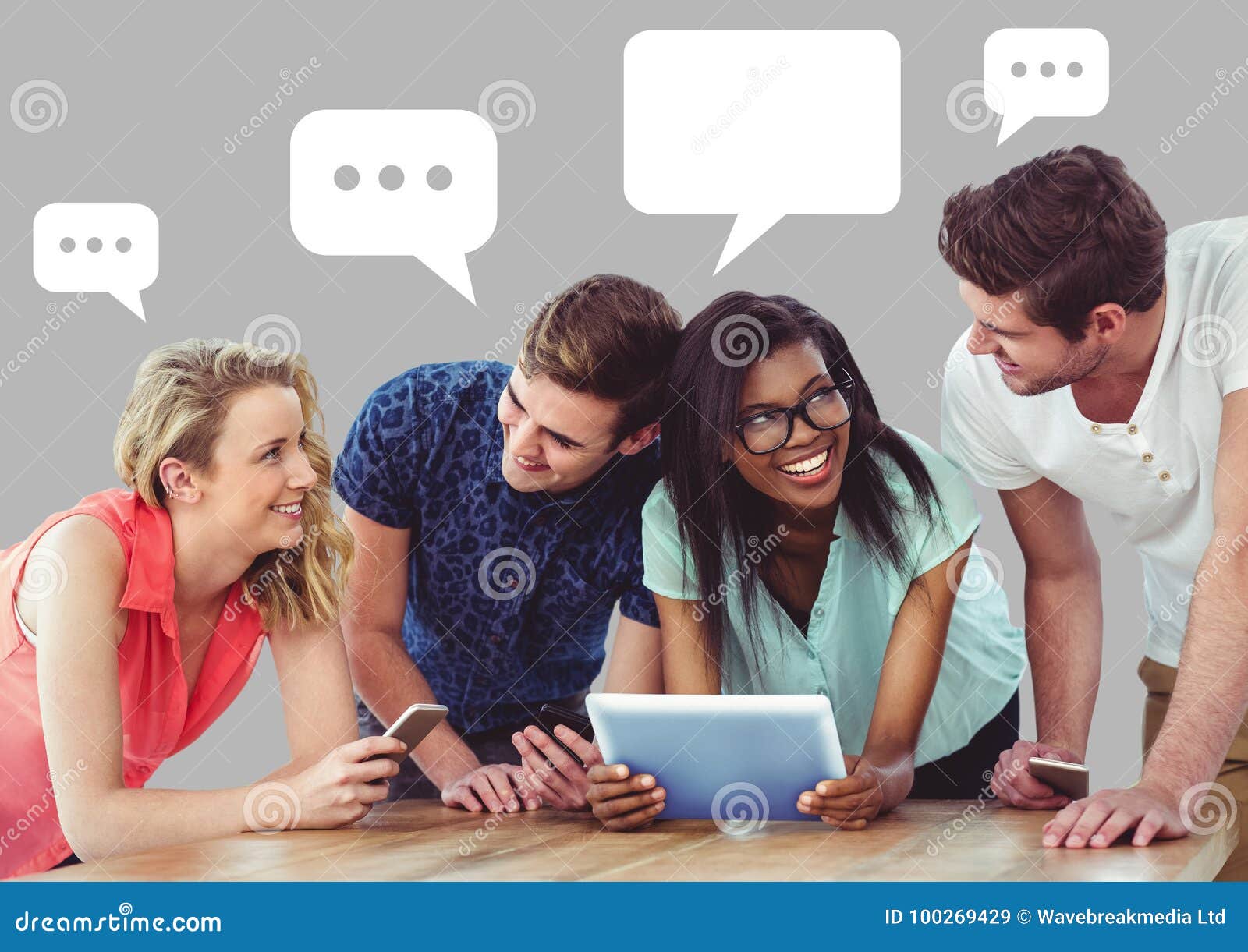 People Discussing Presentation on Tablet with Empty Chat Bubbles Stock ...