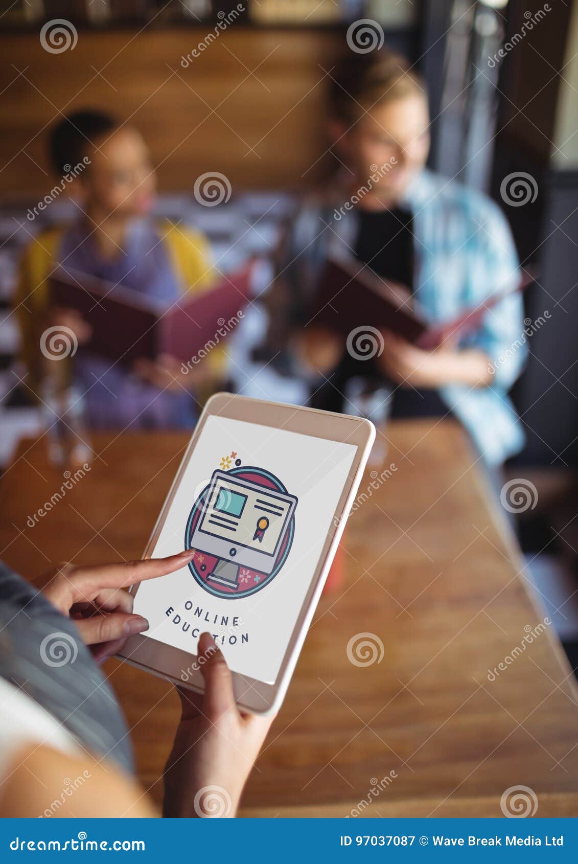 Person Using a Tablet with E-learning Information in the Screen Stock ...