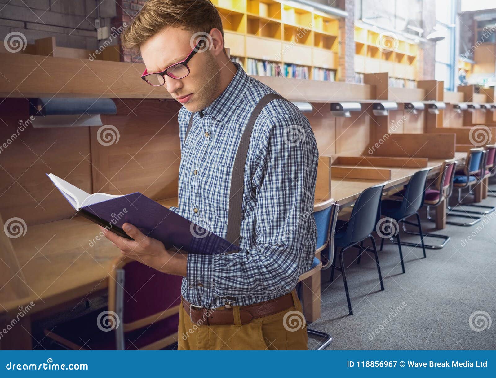 Student Man in Education Library Stock Image - Image of geek, chairs ...