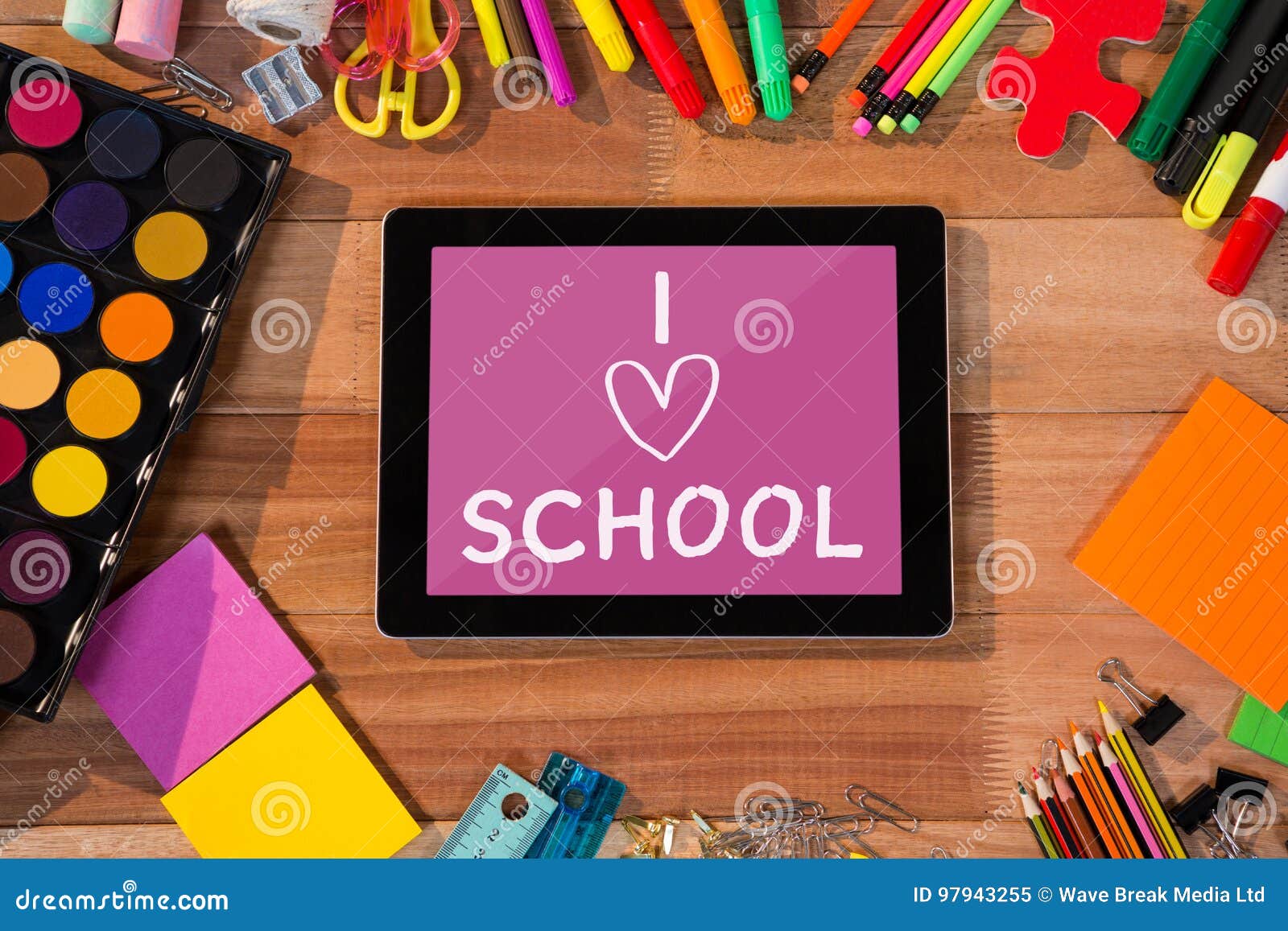 Tablet on a School Table with School Icons on Screen Stock Image ...