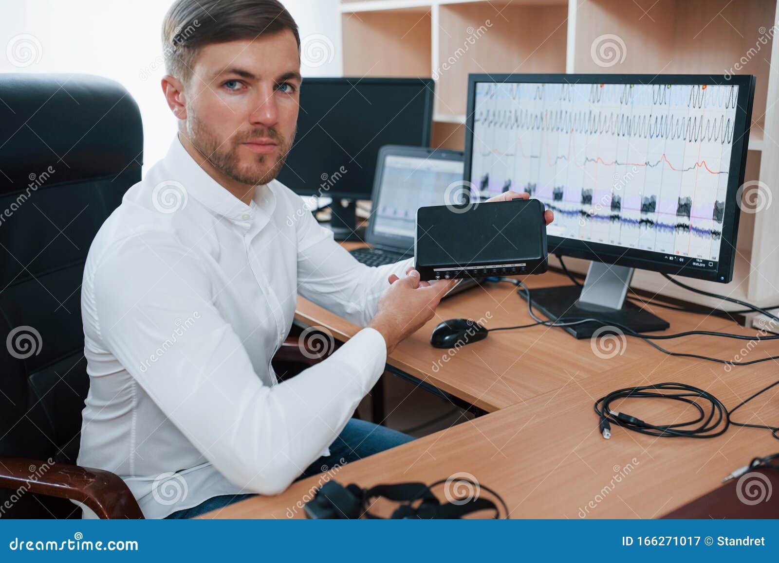 Digital Device. Polygraph Examiner Works in the Office with His Lie ...