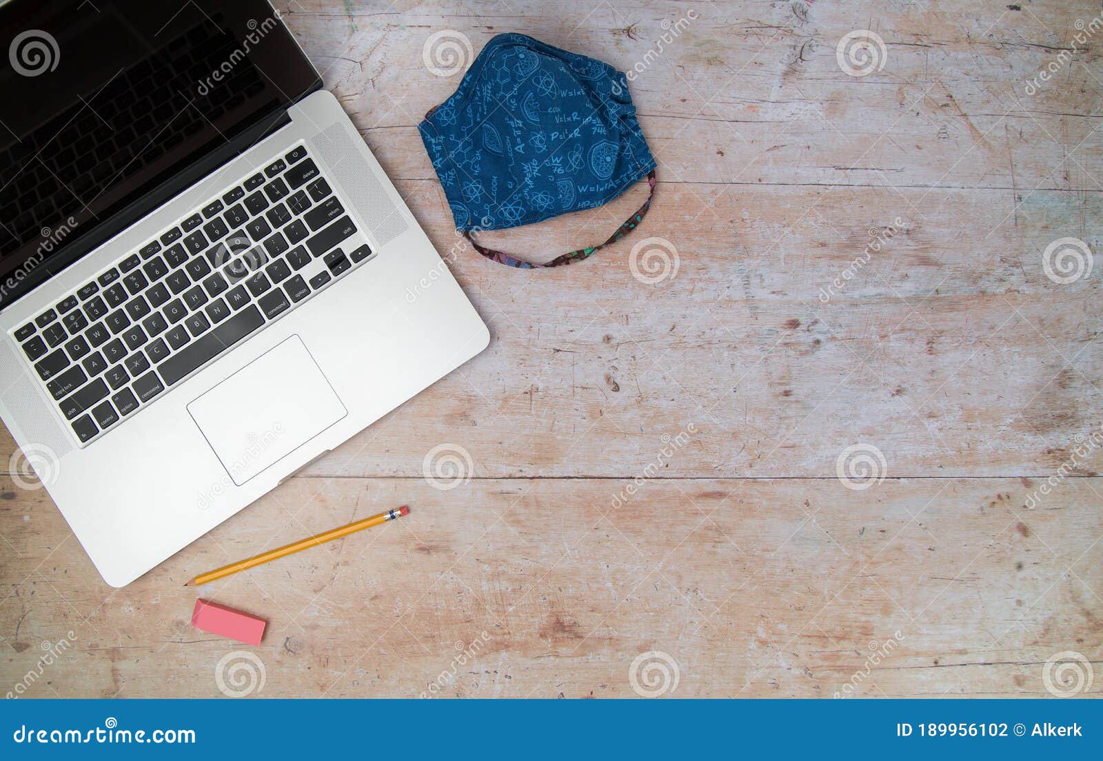 Digital Learning Laptop and Mask on Wood Desk Stock Photo - Image of ...
