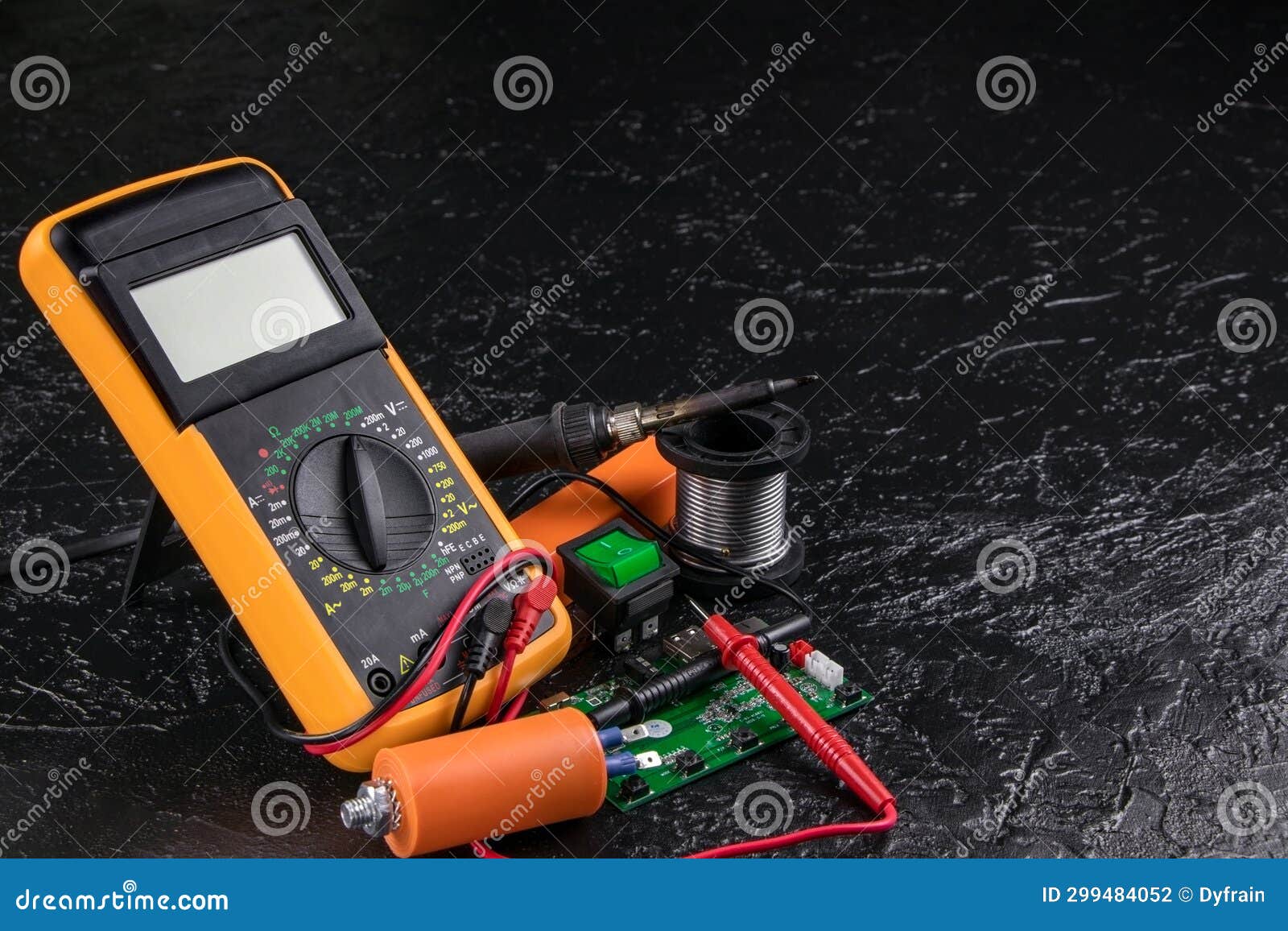 Digital Multi-meter with Probes on a Black Stone Background ...