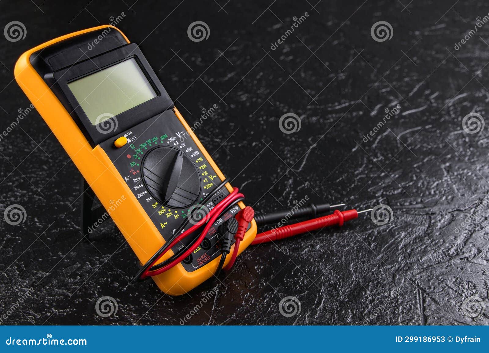 Digital Multi-meter with Probes on a Black Stone Background ...