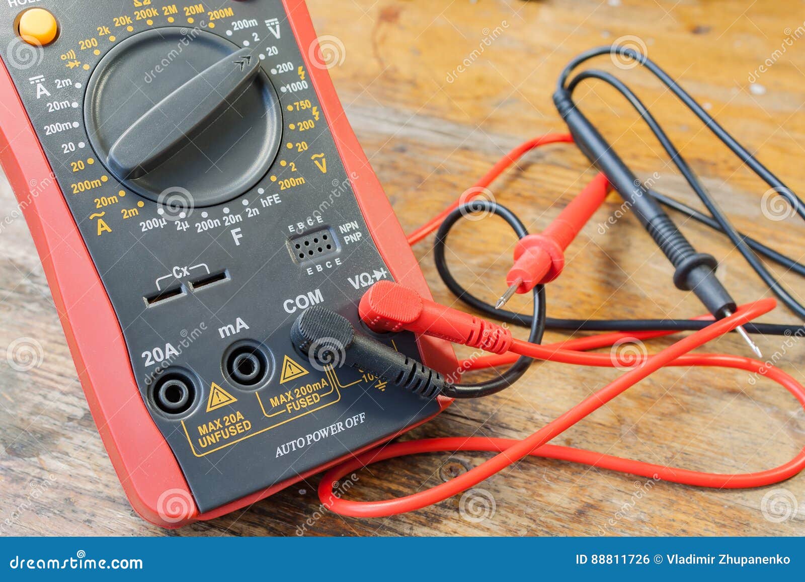 Digital Multimeter with the Connected Probes on a Table in a Workshop ...