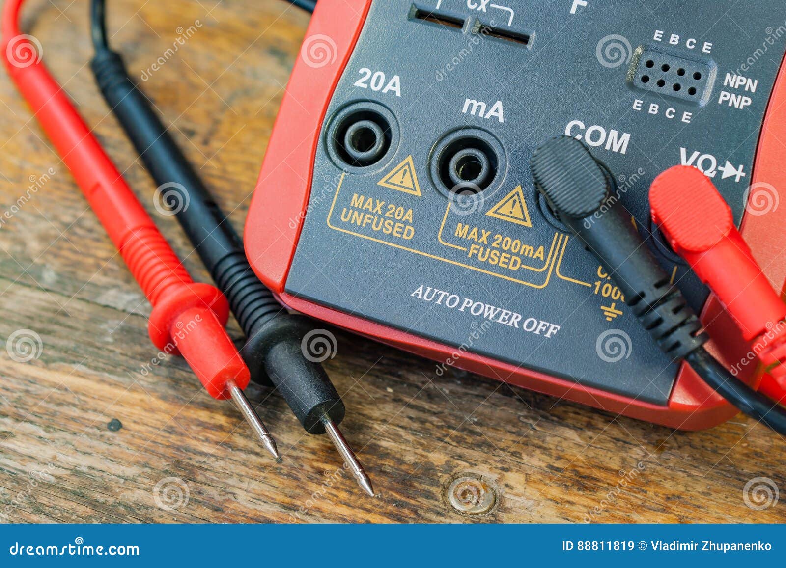 Digital Multimeter with the Connected Probes on a Table in a Workshop ...
