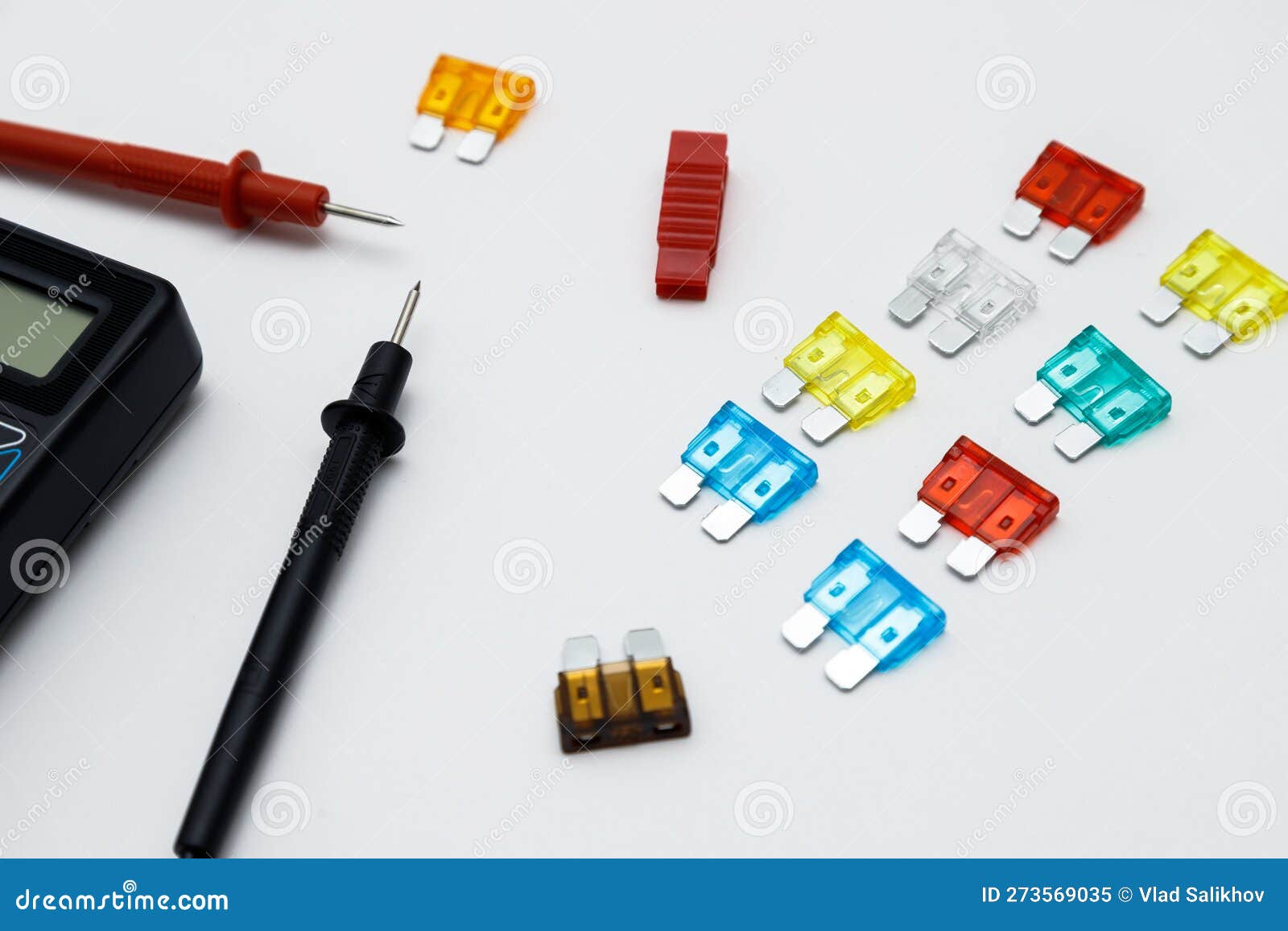 Digital Multimeter for Measuring Electrical Elements and Car Fuses on a ...