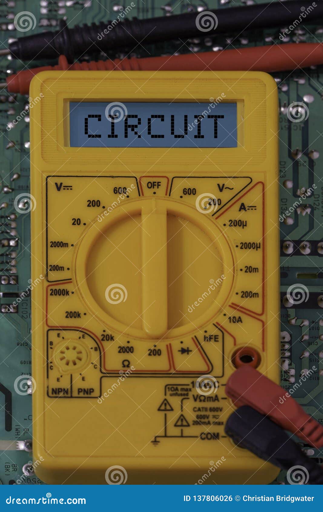 Digital Multimeter Multitester on a Circuit Board with the Word Circuit ...