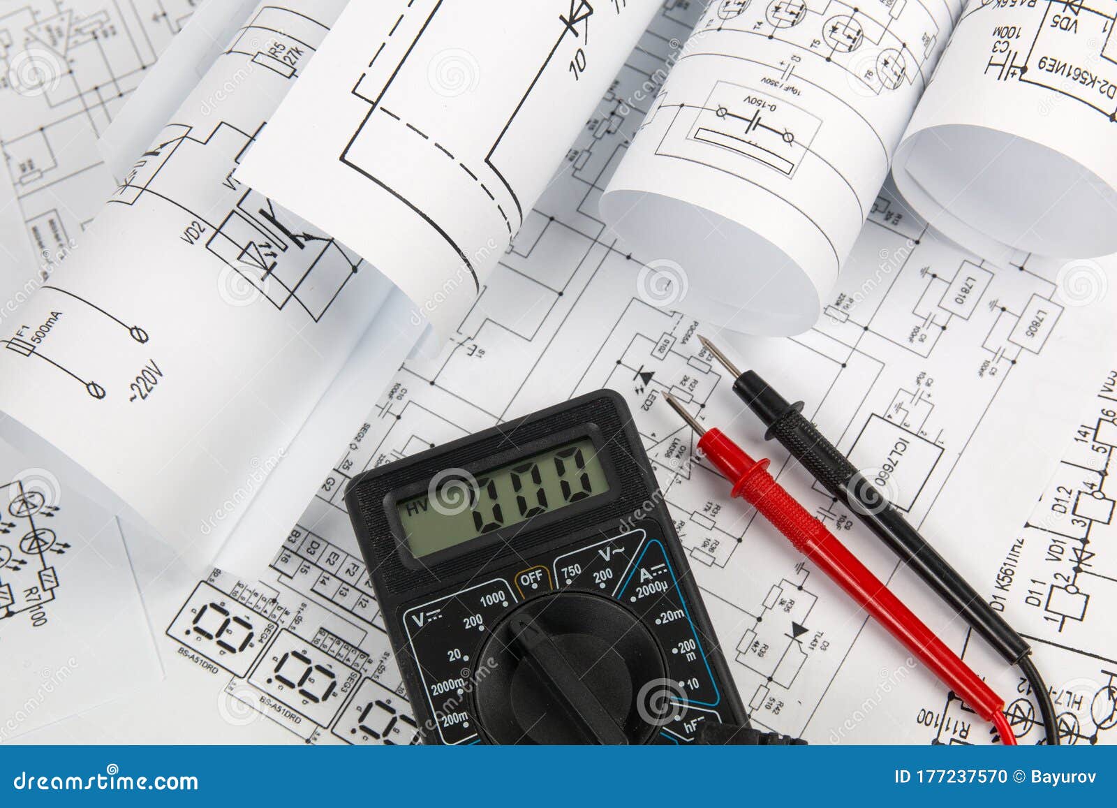 Digital Multimeter and Paper Electrical Engineering Drawings. Stock ...