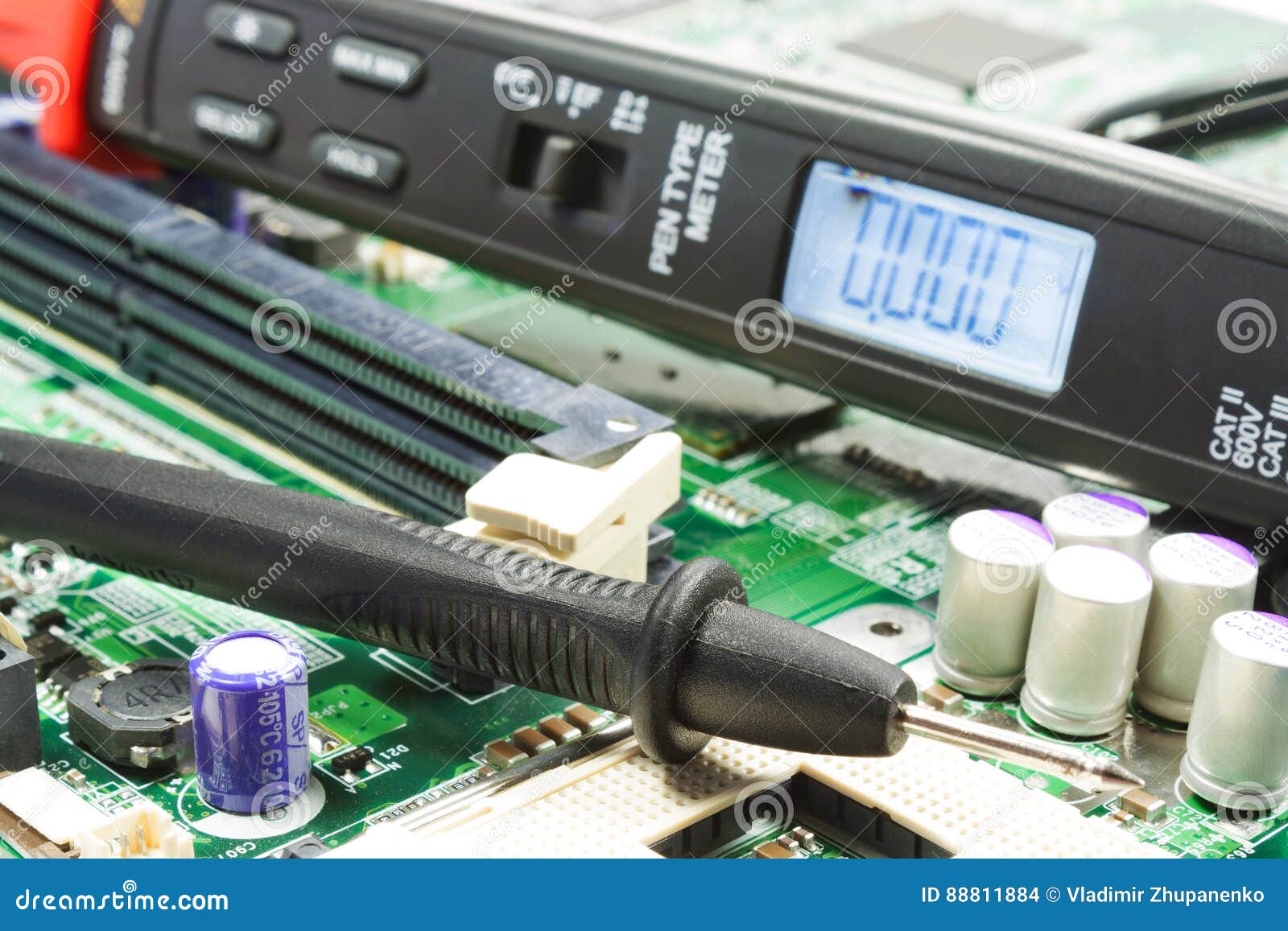 Digital Multimeter Pen Type on the Motherboard in a Workshop Stock ...