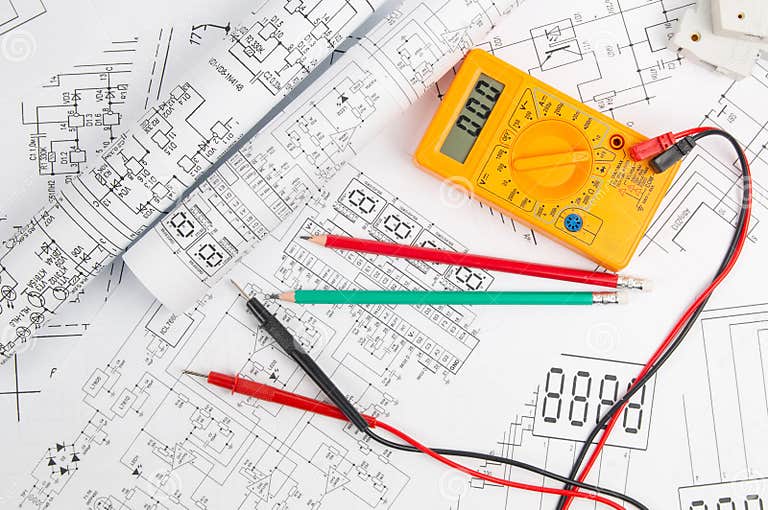 Digital Multimeter and Pencils on Paper Electrical Engineering Drawings ...