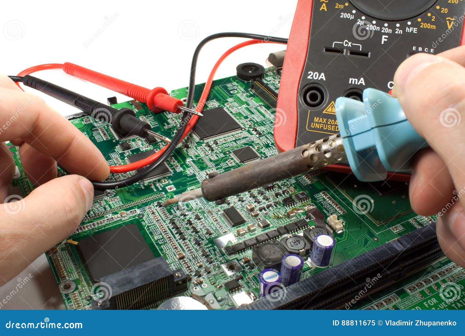 Digital Multimeter with Probe and Soldering Iron in the Engineer`s ...