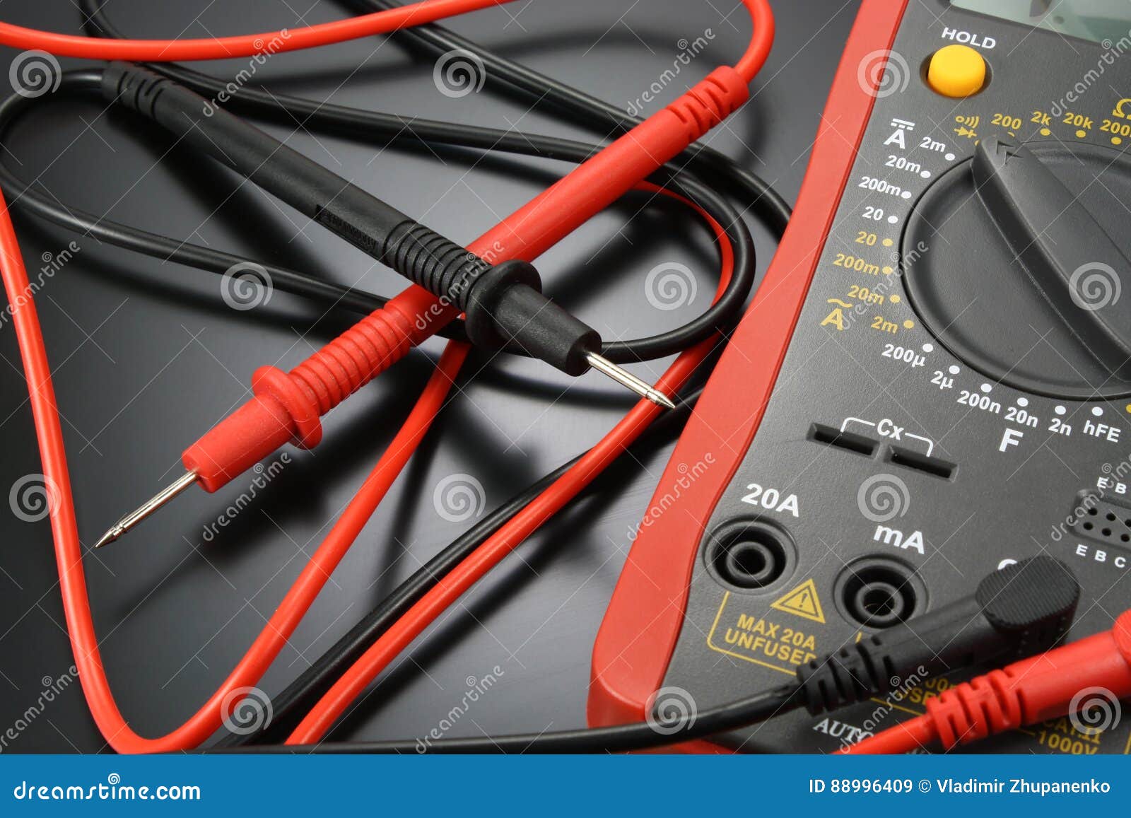 Digital Multimeter with Probes on a Black Background Stock Image ...