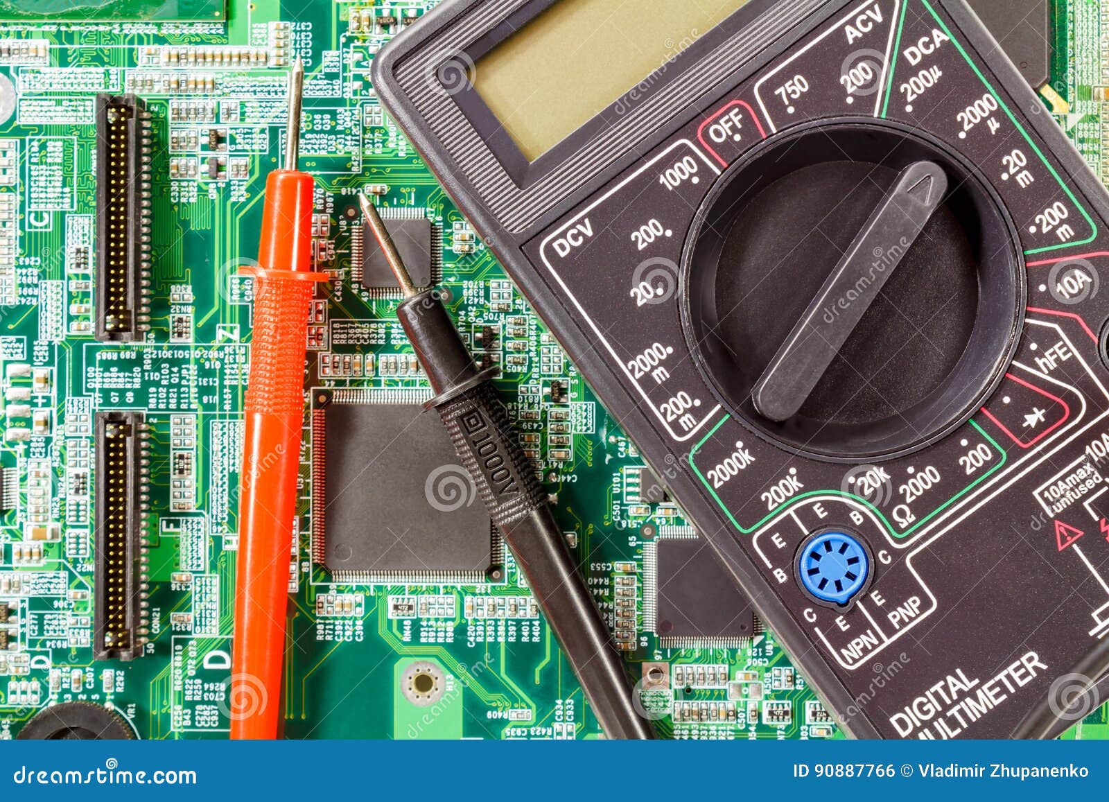 Digital Multimeter and Probes on a Green Circuit Board Closeup Stock ...