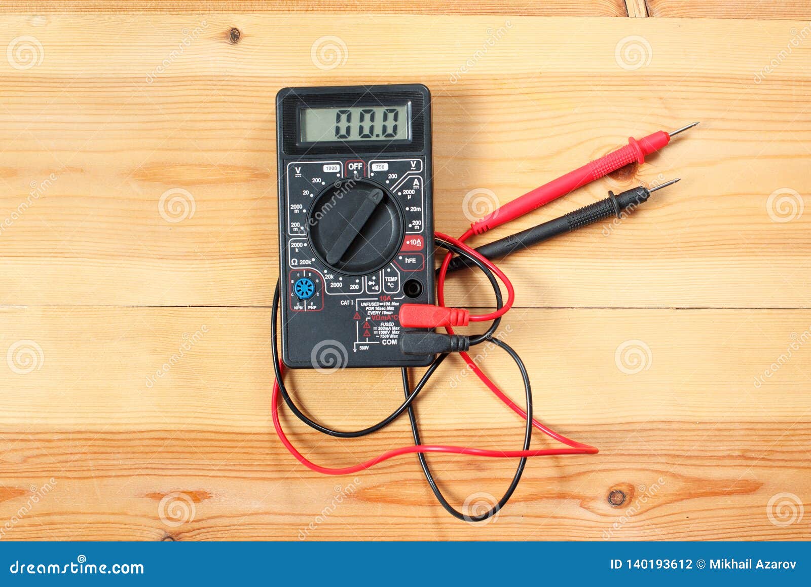 Digital Multimeter and Wiring on Wooden Table. Special Tools of ...