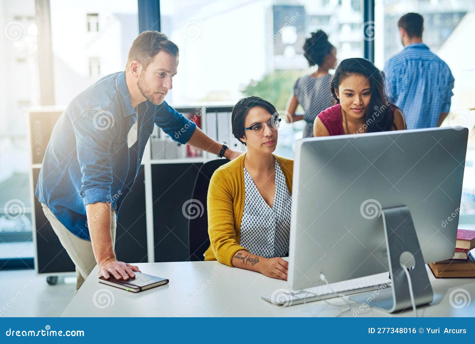 Digital Planning in Progress. a Group of Colleagues Working Together on ...