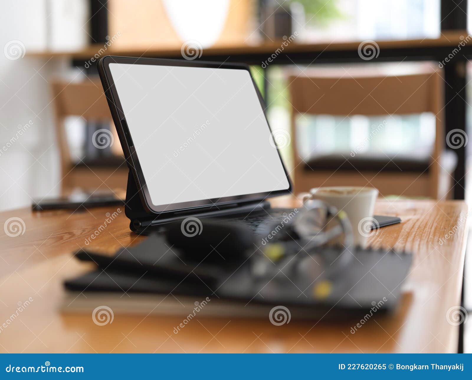 Digital Portable Tablet in Empty Screen Mockup Standing on Wooden Work ...