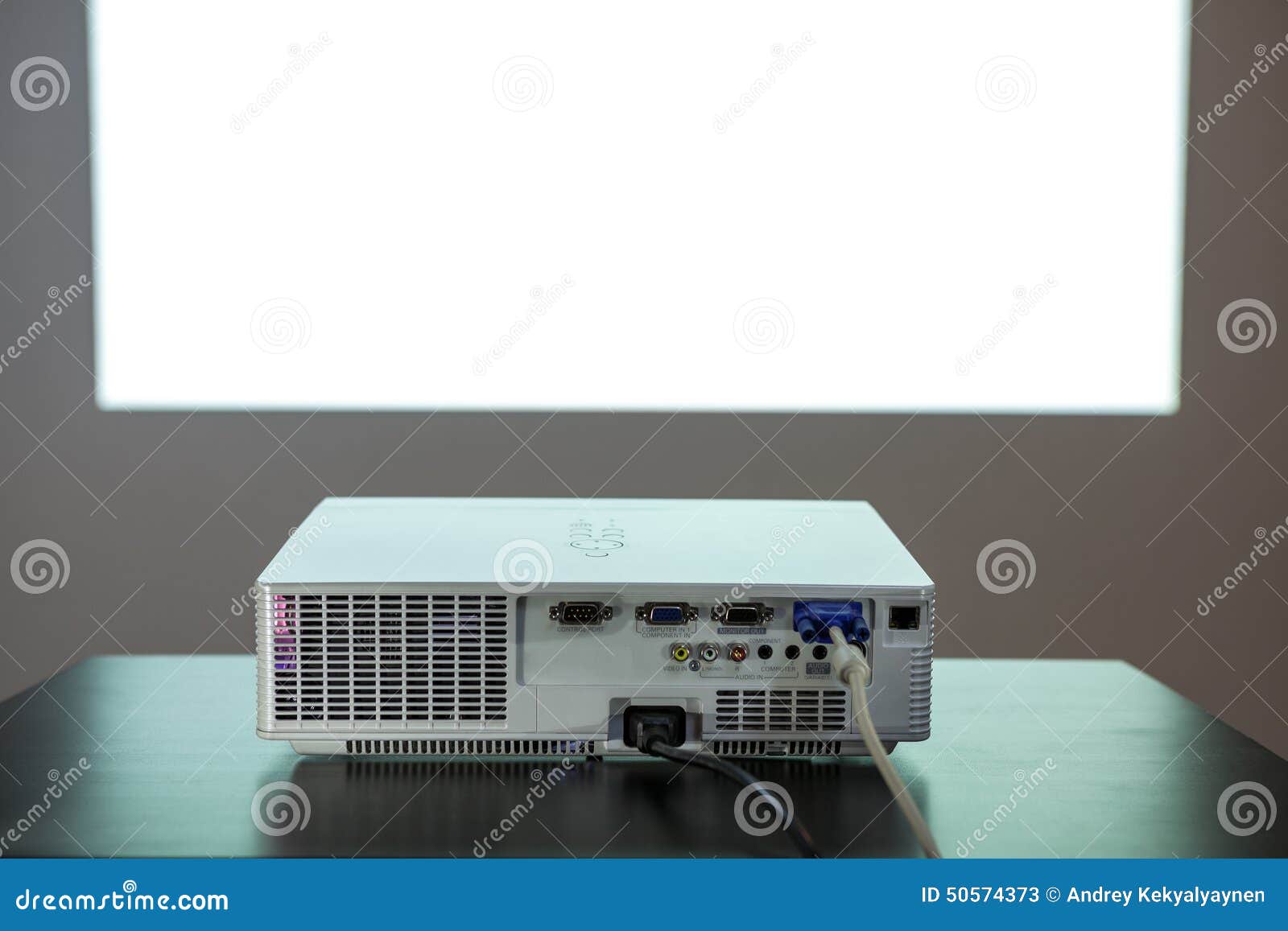 Digital Projector on Table, with Big Isolated White Screen on the Wall ...