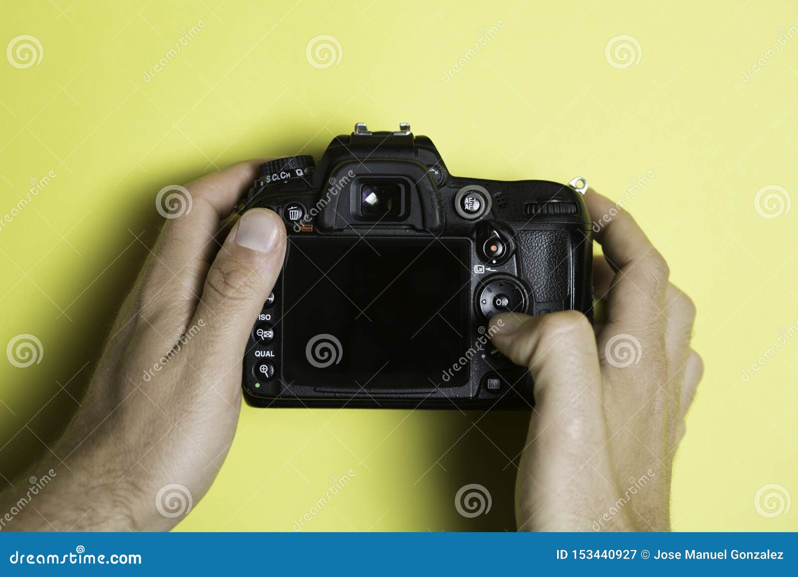 Digital Single Lens Reflex on Yellow Background, Screen Off View from ...