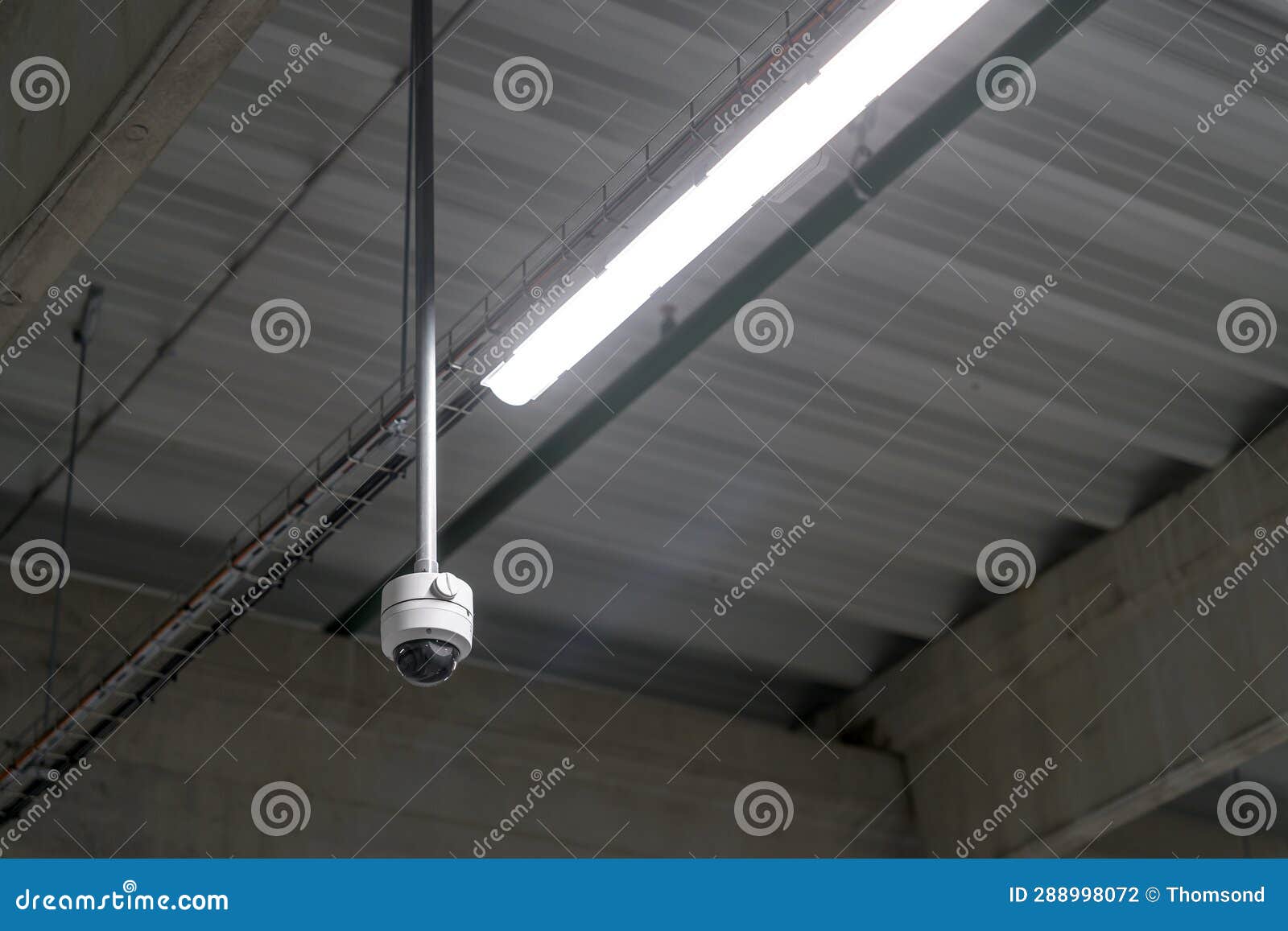 Digital Surveillance Camera on the Ceiling in a Warehouse Room Stock ...