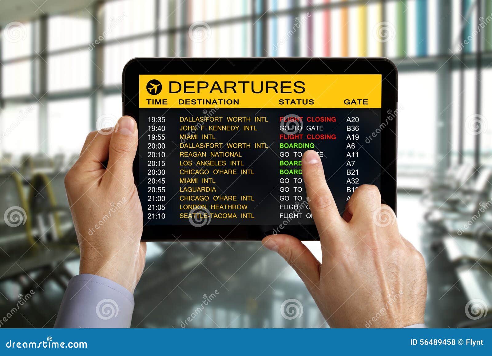 Digital Tablet in Airport with Flight Information Stock Photo - Image ...