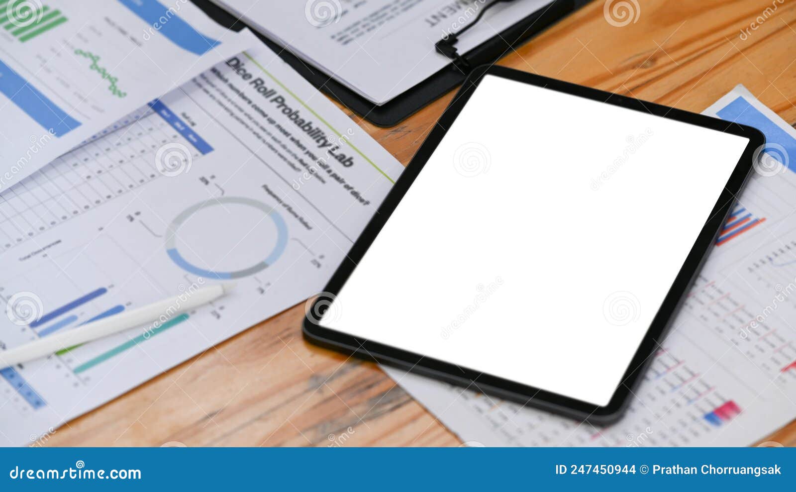 Digital Tablet with Blank Screen and Financial Documents on Office Desk ...
