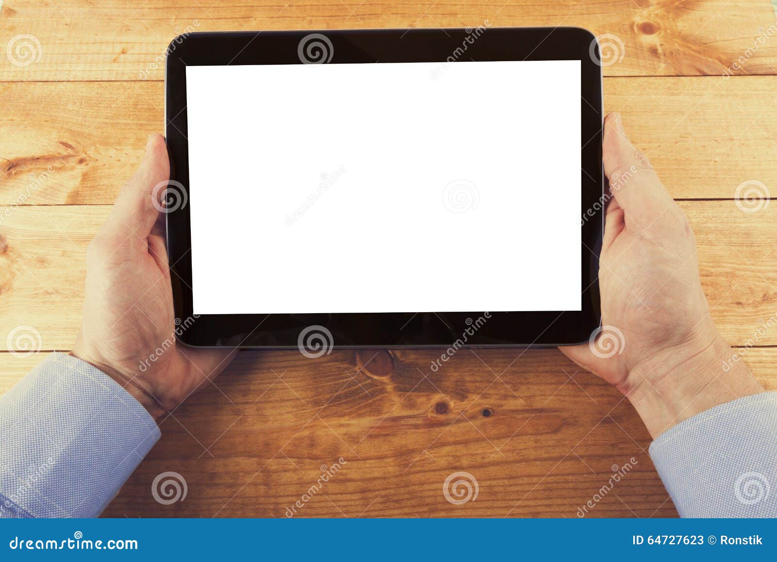 Digital Tablet with Blank Screen in Hands on the Wooden Table Stock ...