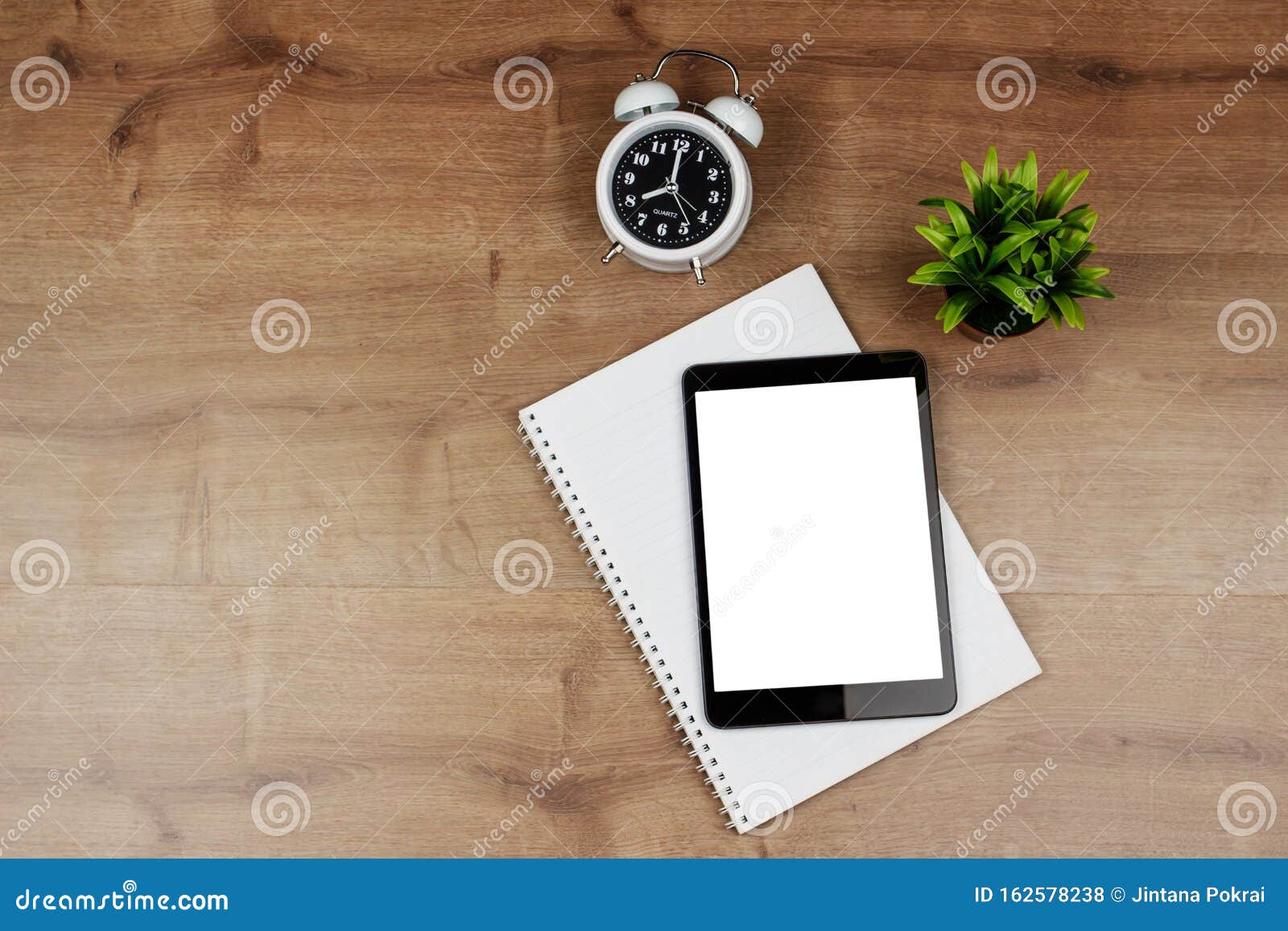 Digital Tablet with Blank Screen and Notebook on Wooden Stock Photo ...